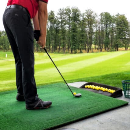 Golf Simulators Vs. The Driving Range: Which is Better?